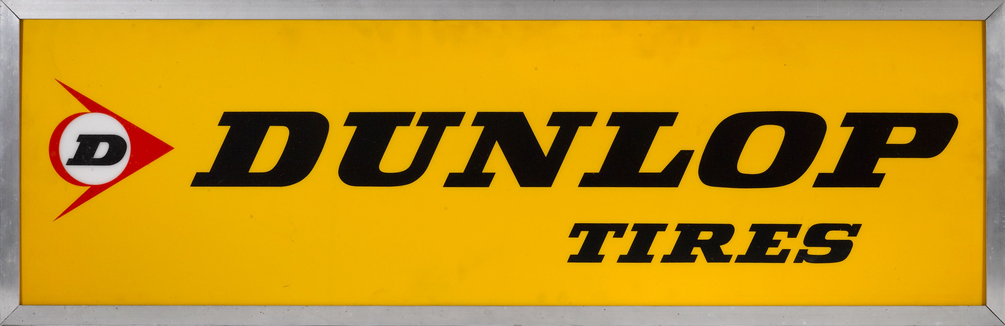 Bonhams Cars : An illuminated 'Dunlop Tires' sign,