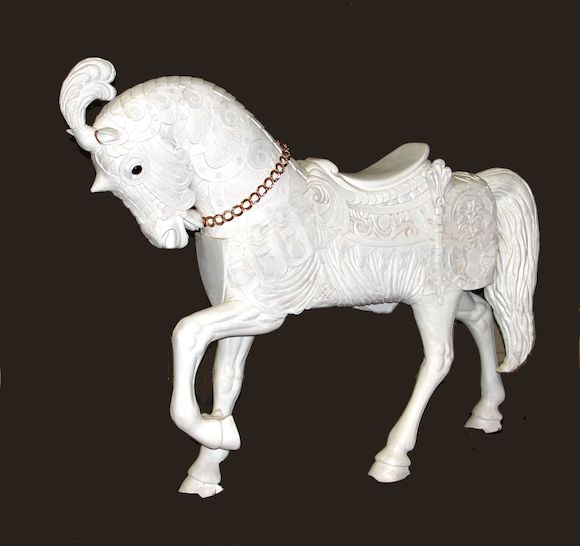 Bonhams : After Marcus Illions A carved wood and painted carousel horse