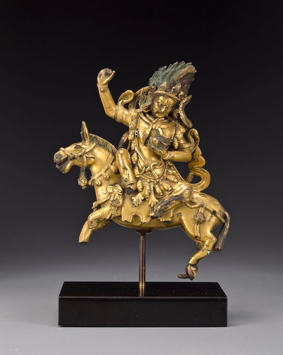 Bonhams : A gilt copper alloy figure of Sri Devi Tibet, 17th/18th century