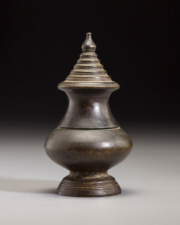 Bonhams : Copper alloy lime pot Cambodia, 13th/16th century