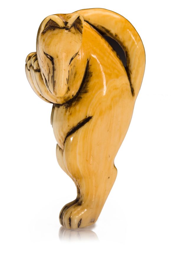 Bonhams : An ivory netsuke of a dancing fox Edo period (late 18th century)