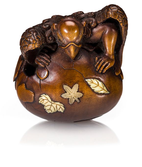 Bonhams : A wood and ivory netsuke of tengu no tamago Meiji period ...