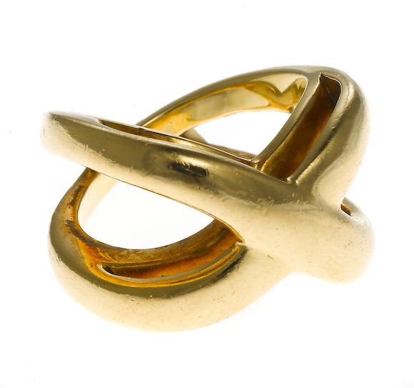 Bonhams : An eighteen karat yellow gold "x" ring, Tiffany & Co.