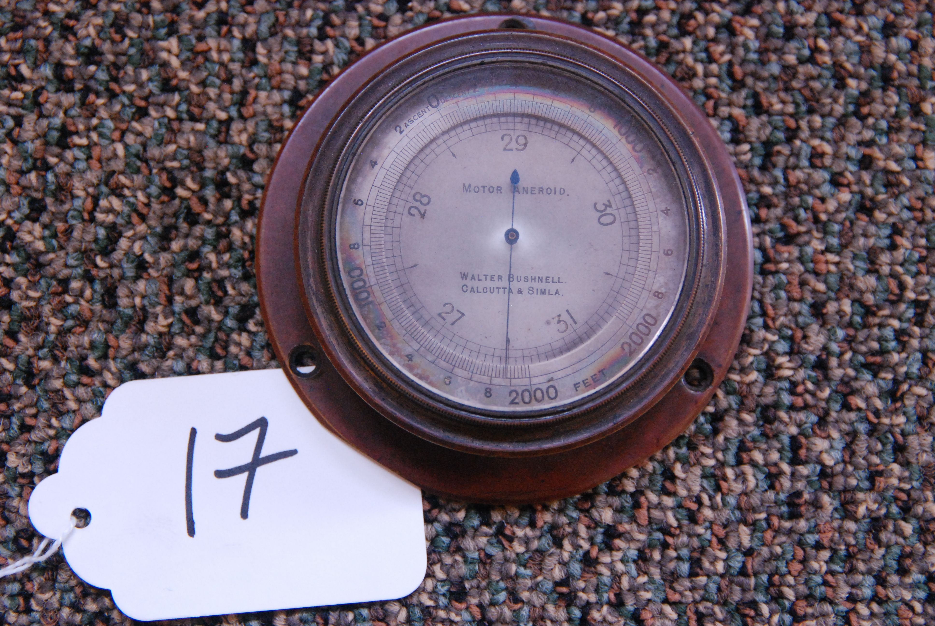 Bonhams Cars : A Motor Aneroid altimeter.