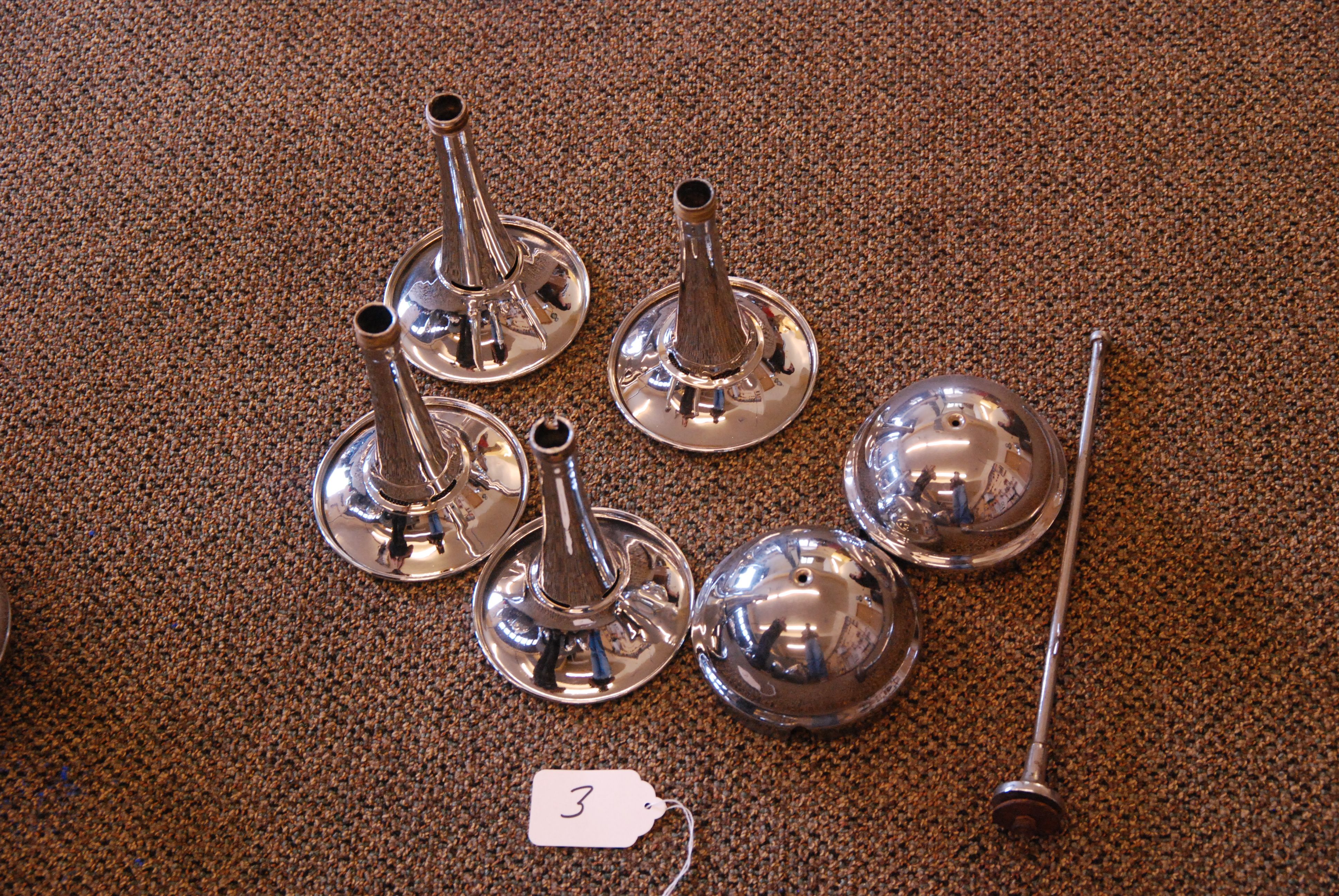 Bonhams Cars : A set of four Lucas trumpet horn bells and caps,
