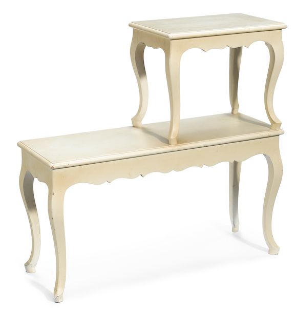 Bonhams : A Frances Elkins cream painted two-tiered side table