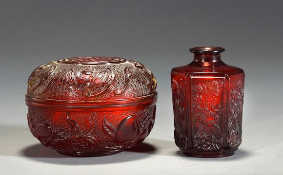 Bonhams : Two red Peking glass decorations Qianlong marks, Republic period