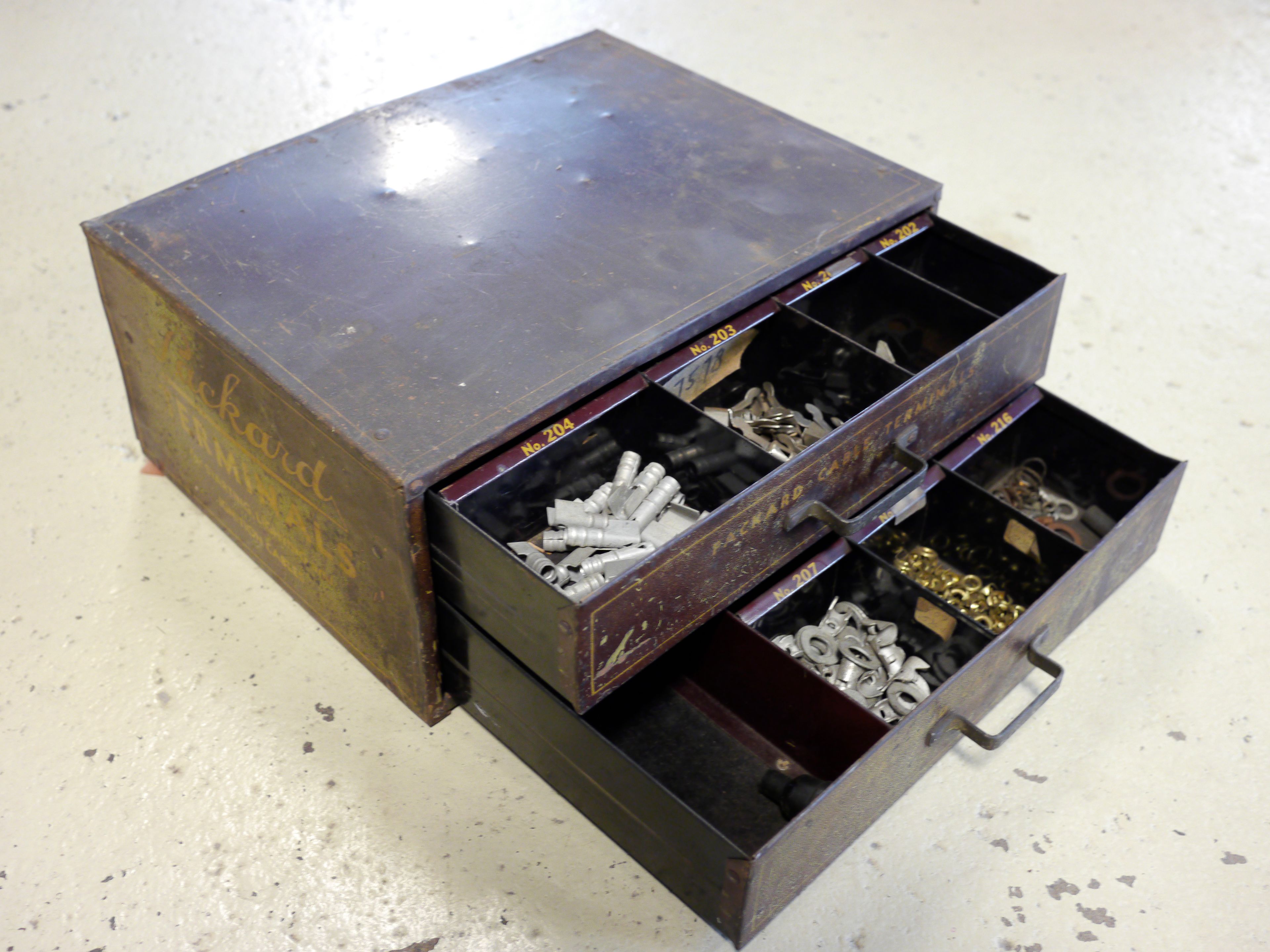 Bonhams Cars : A vintage Packard cable terminals storage box,