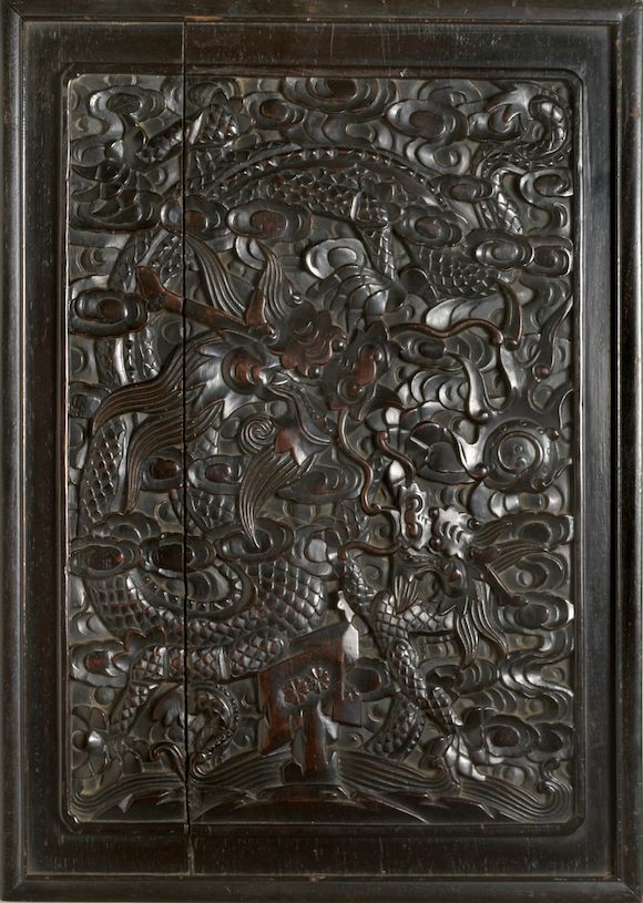 Bonhams : Two carved hardwood dragon panels Qing dynasty