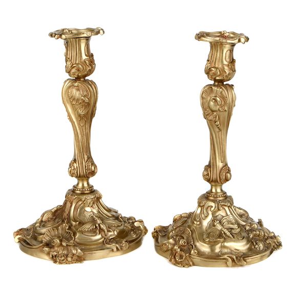Bonhams : A pair of Rococo style bronze candlesticks