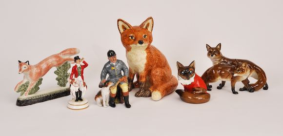 Bonhams : Six various glazed ceramic fox hunting-themed figures