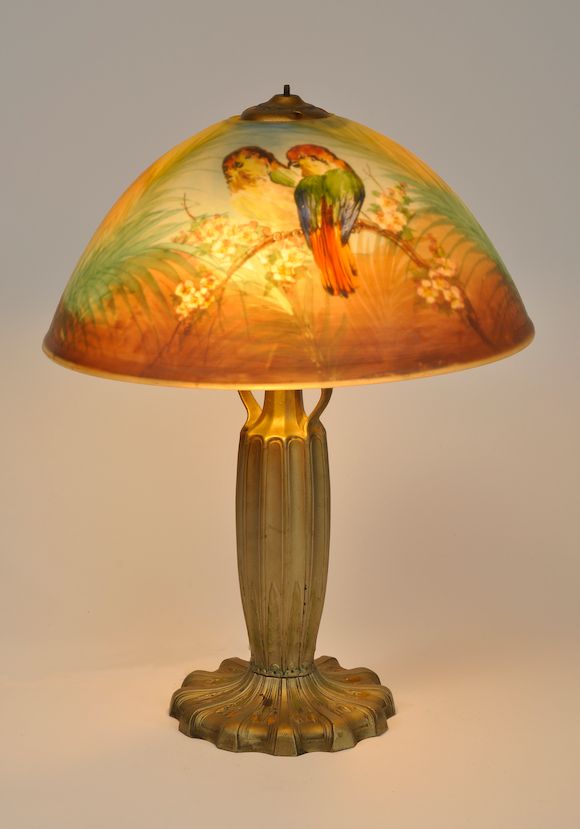 Bonhams : An American reverse-painted glass and gilt metal Parrot table ...