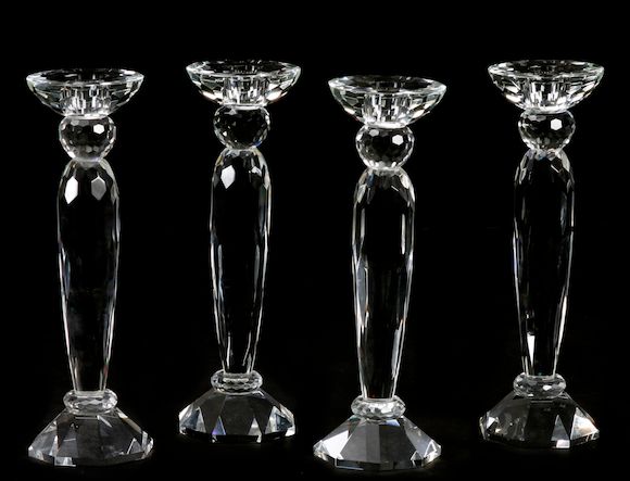 Bonhams : A set of four cut glass candlesticks