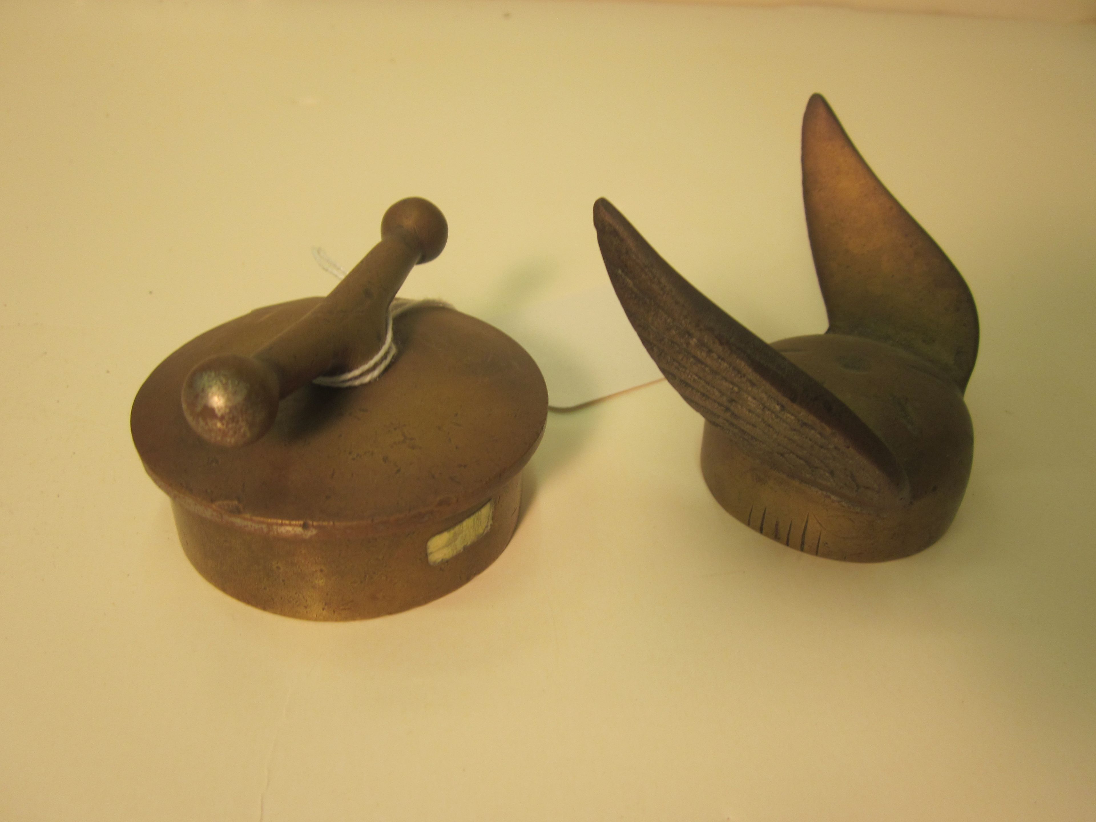 Bonhams Cars : A lot of two brass radiator caps,