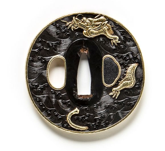 Bonhams : Tsuba with dragon in waves, gold rim