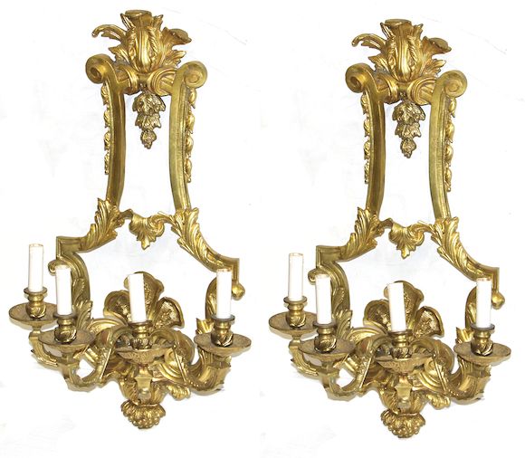 Bonhams : A pair of Régence style gilt bronze four light bras de ...