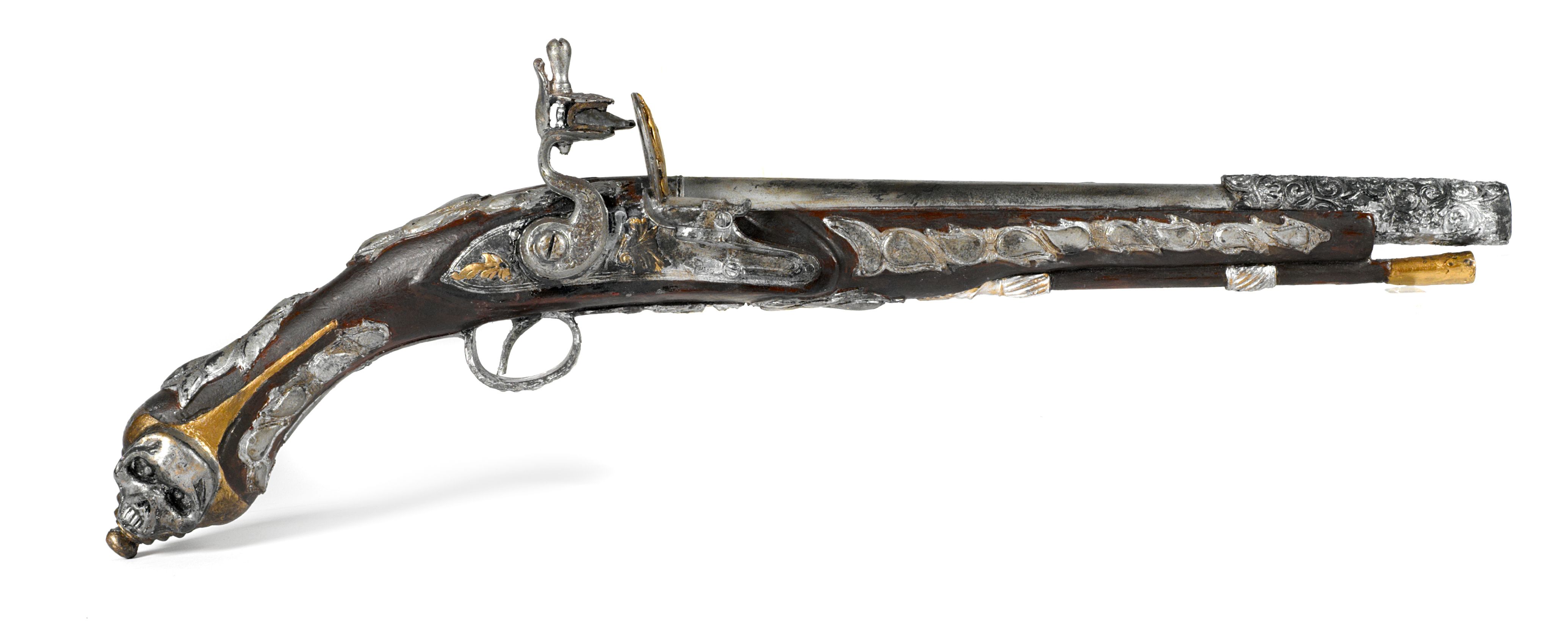 A Captain Barbossa resin prop pistol from Pirates of the Caribbean ...