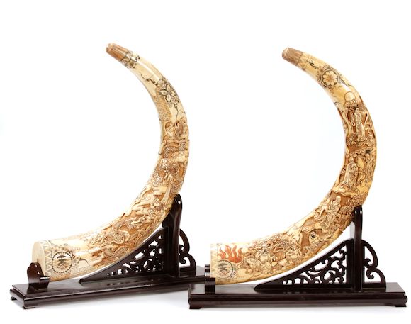 Bonhams : A pair of Chinese bone veneered tusks on stands