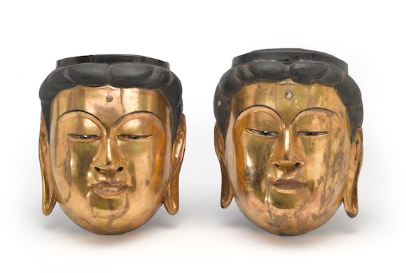 Bonhams : A pair of Japanese giltwood masks of Buddhist deities