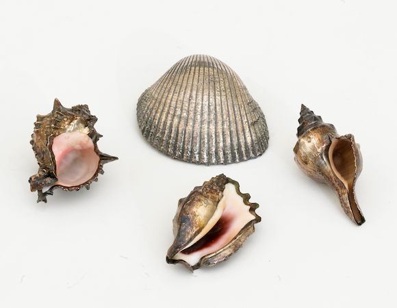 Bonhams : A group of four various silver deposit decorated sea shells