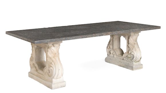 Bonhams : A Baroque style cast stone and granite garden table