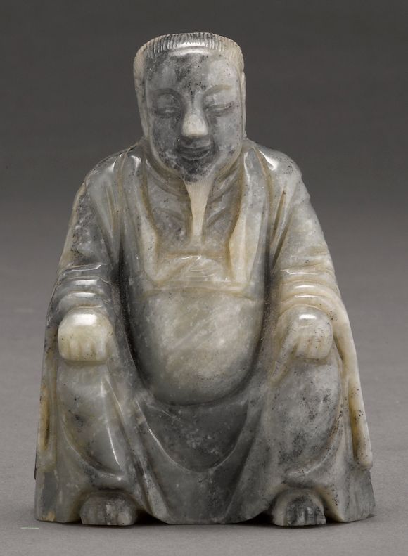 Bonhams : A gray jade carving of Zhenwu 20th century