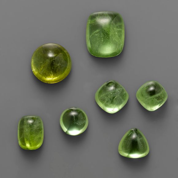 Bonhams : Group of Seven Peridot Cabochons