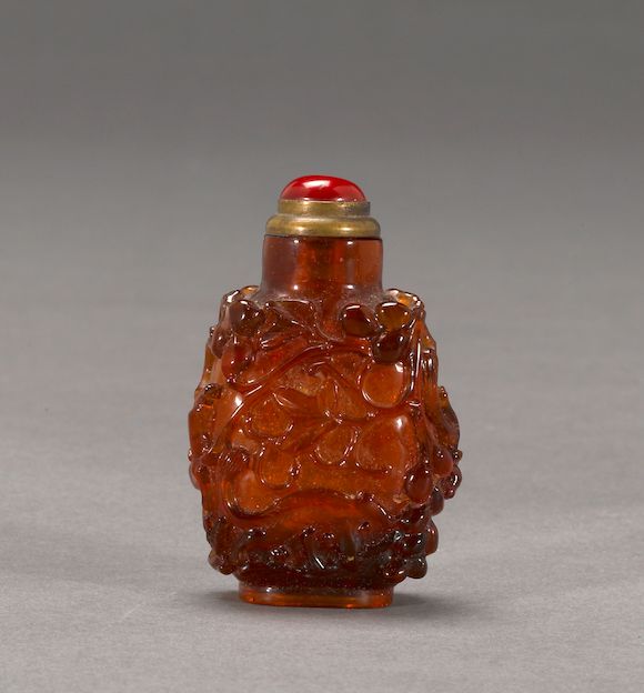 Bonhams : A carved amber snuff bottle 1860-1920