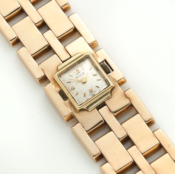 Bonhams : A retro 14k gold watch,