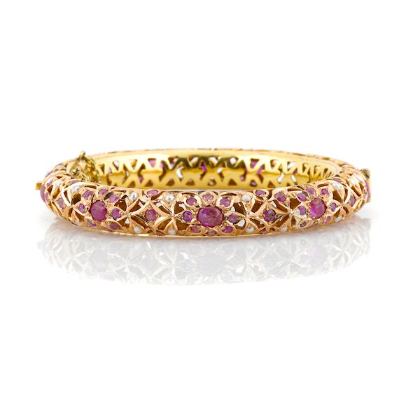 Bonhams : A ruby, lead glass filled ruby, seed pearl and 14k gold ...