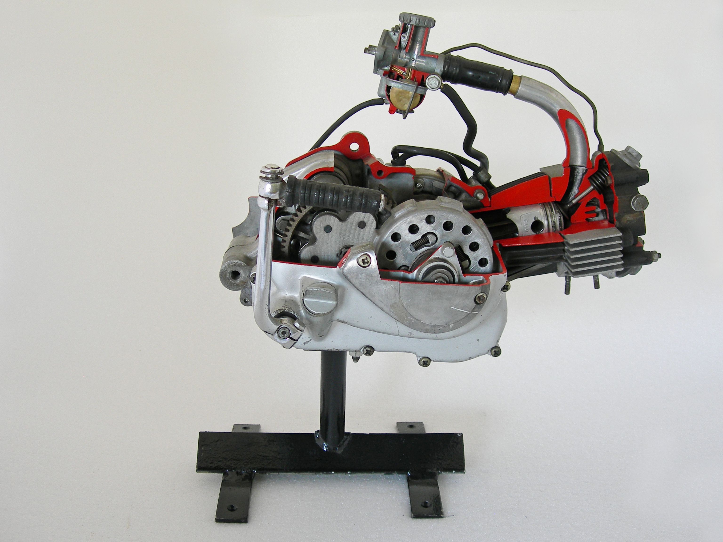 Bonhams Cars : A small Japanese single cylinder cutaway engine,