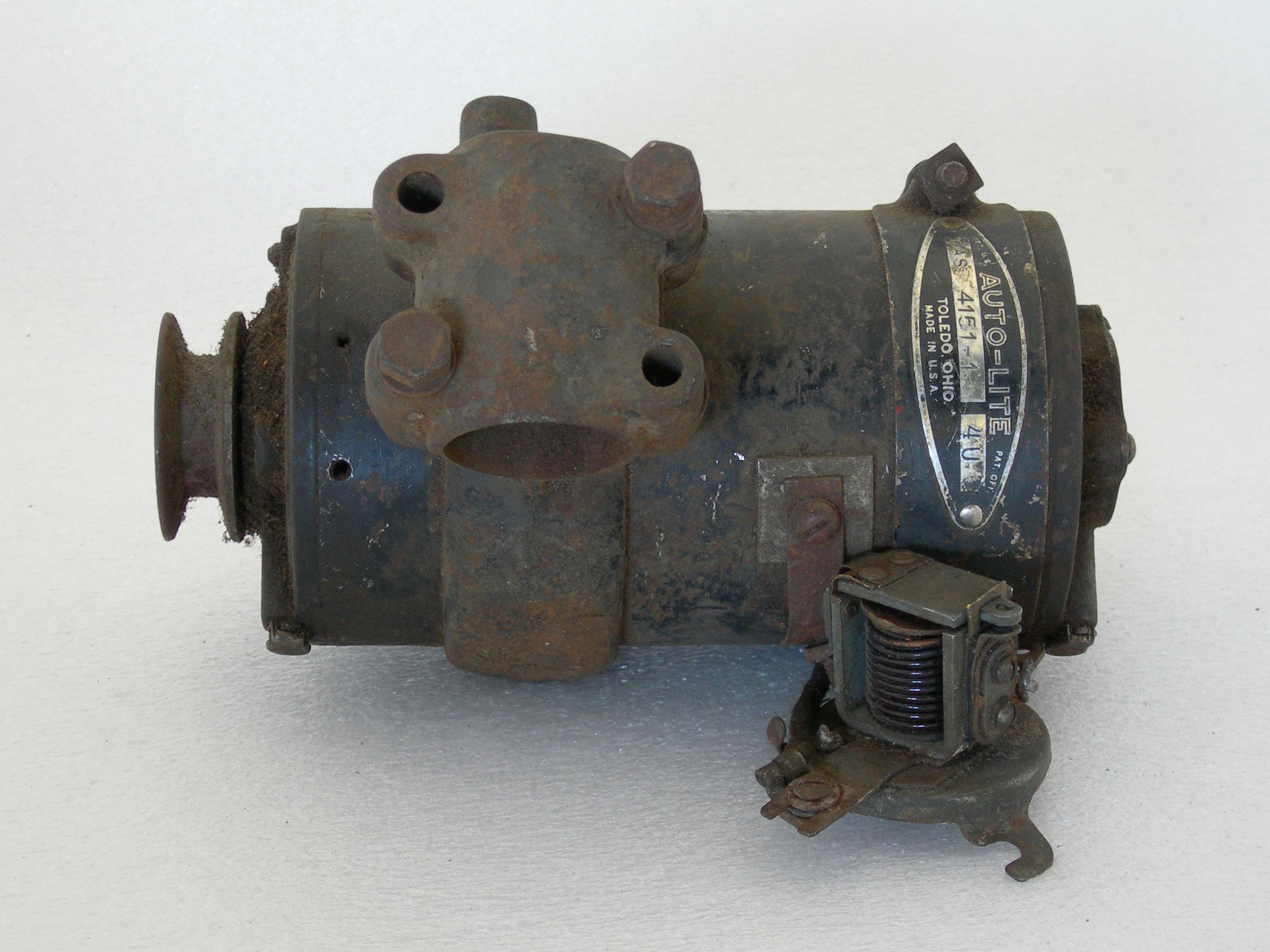 Bonhams Cars : An Auto-Lite motorcycle generator,