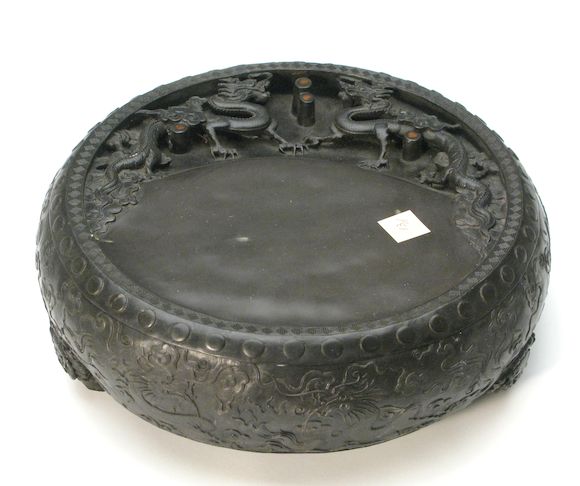 Bonhams : A large Chinese barrel-shaped ink stone