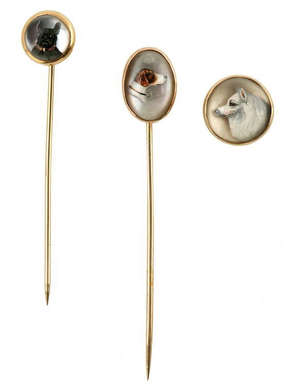 Bonhams : Group of three reverse carved and painted intaglio pins (3)