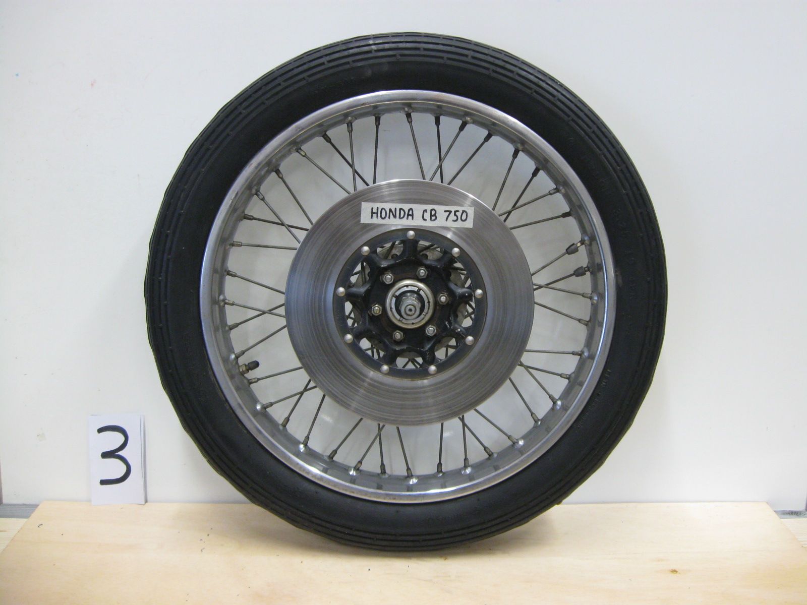Bonhams Cars : A set of front and rear 70s era Honda CB750 wheels,