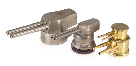 Bonhams : A collection of three naval gun turret models and a pair of ...