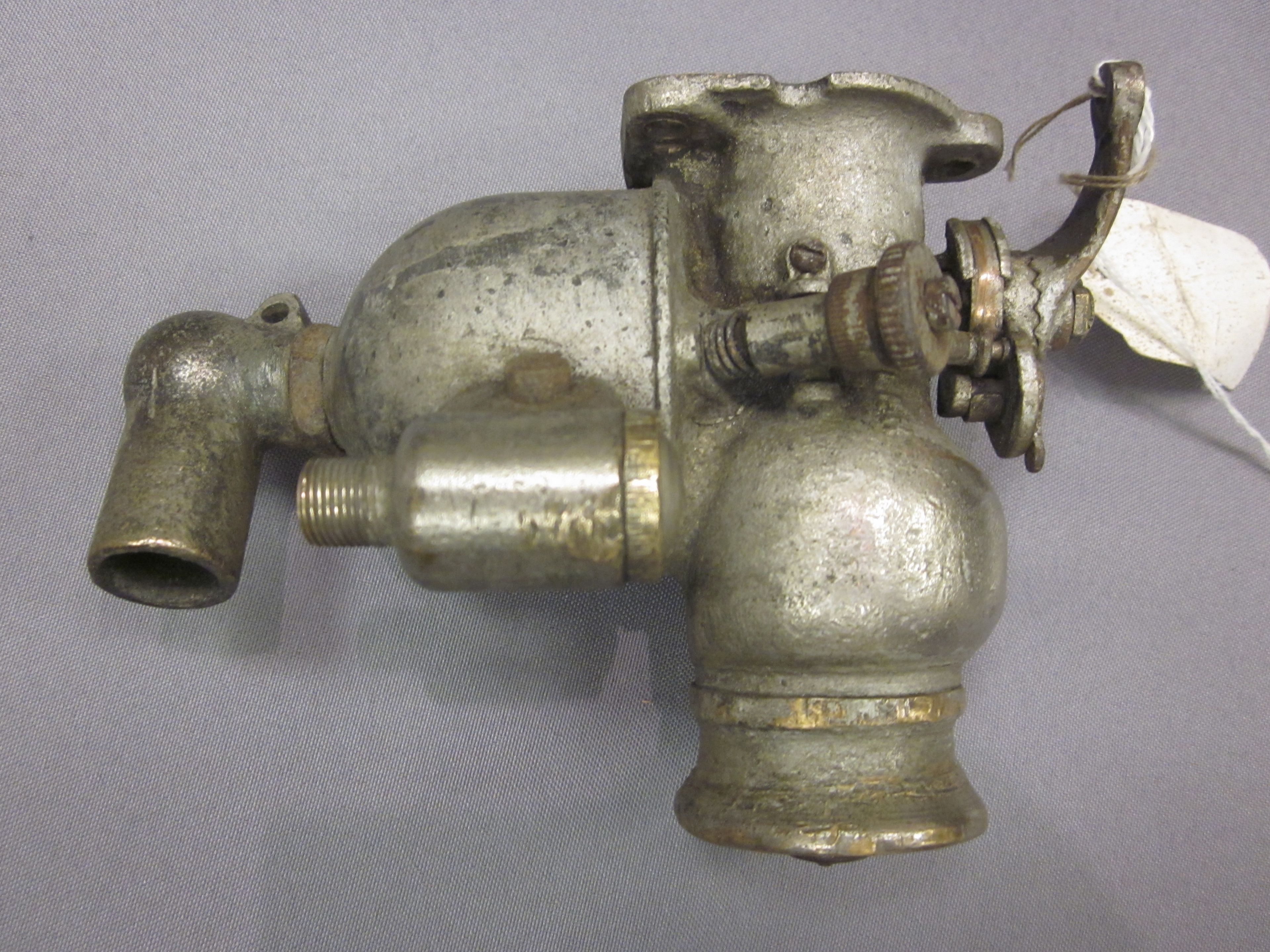Bonhams Cars : A Schebler motorcycle carburetor,