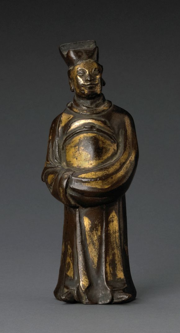 Bonhams : A gilt bronze figure of a scholar 17th/18th century