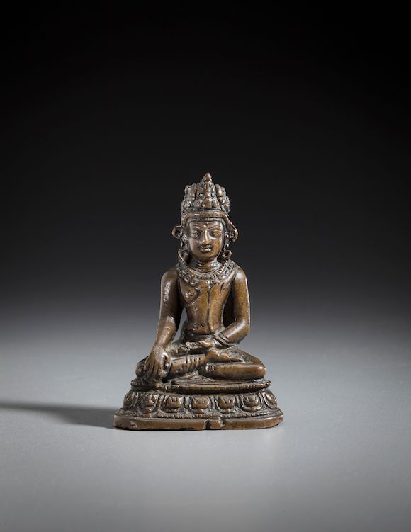 Bonhams : A copper alloy figure of Crowned Buddha India, Kurkihar, Pala ...
