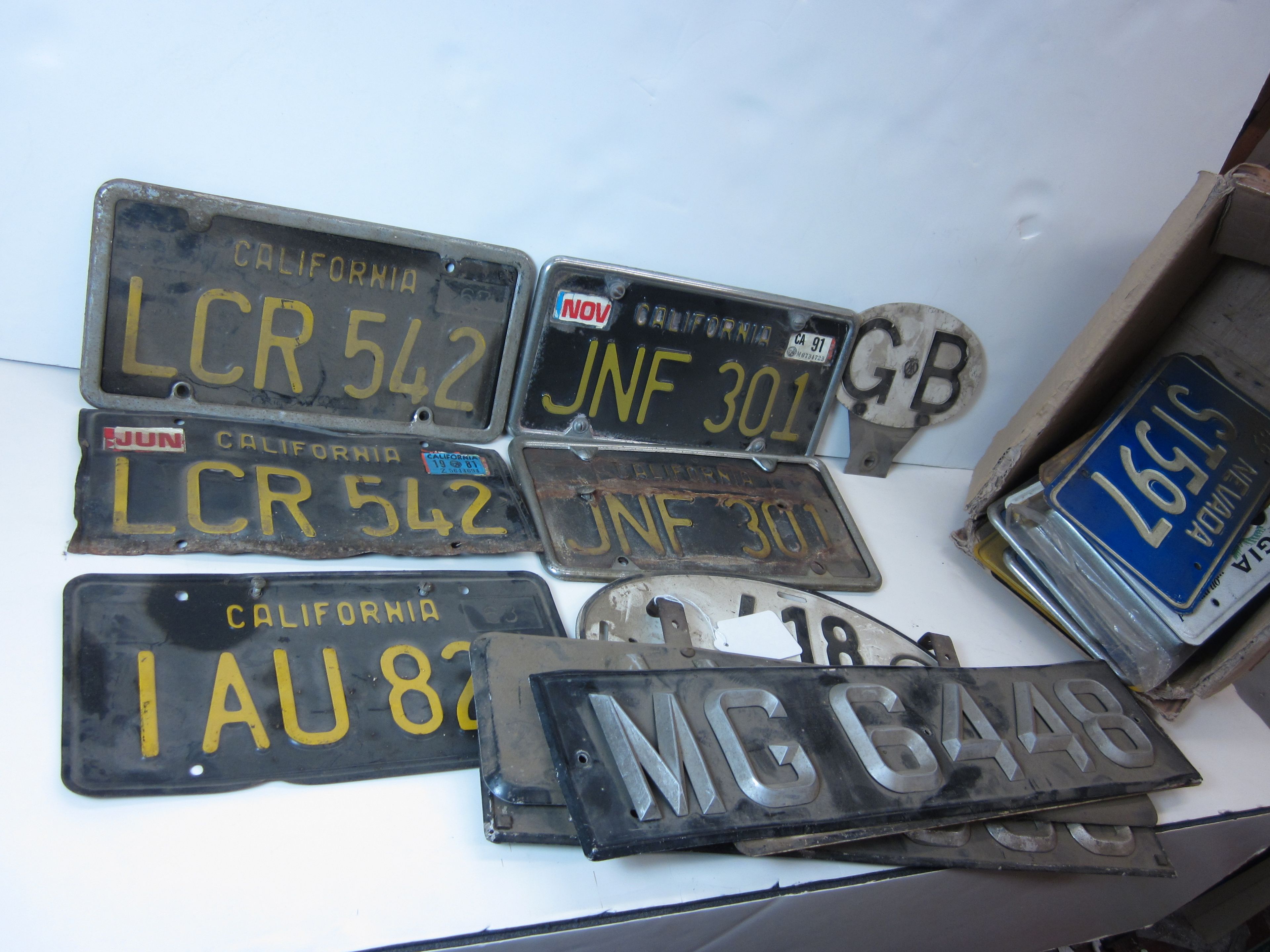 Bonhams Cars : A collection of various license plates some foreign,