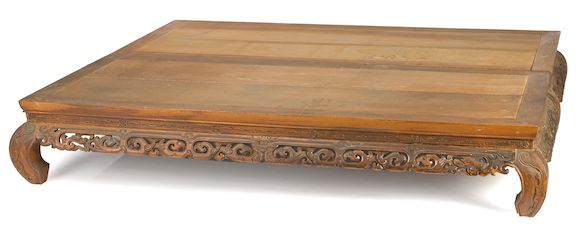 Bonhams : A large two-section mixed wood kang platform