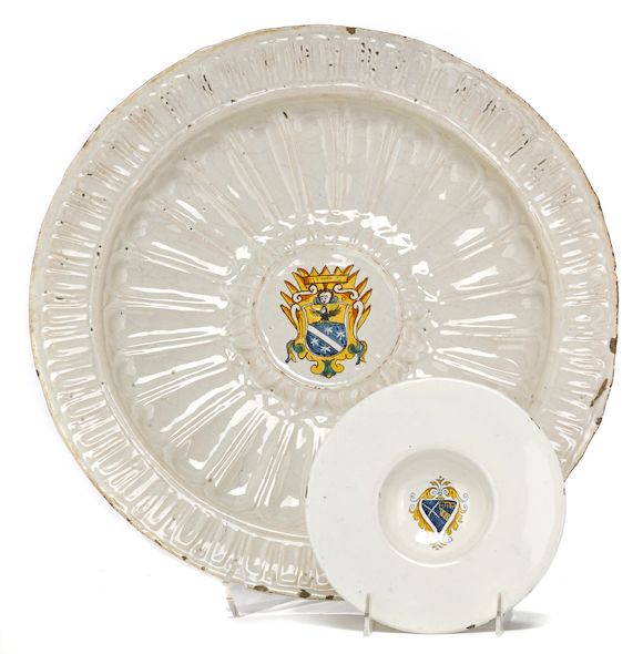 Bonhams : A large Bianco di Faenza molded maiolica armorial display ...