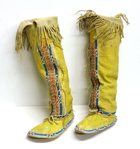 Bonhams : A pair of Kiowa beaded hightop moccasins