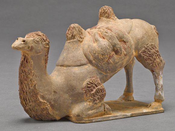 Bonhams : A painted pottery funerary model of a Bactrian camel Six ...
