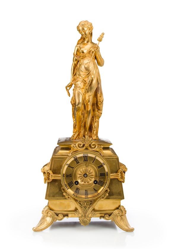 Bonhams : A Neoclassical style gilt bronze figural mantel clock with a ...