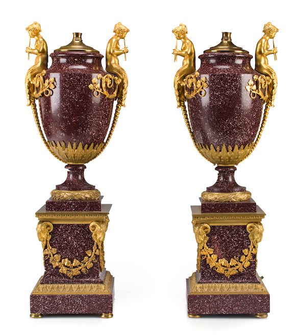 Bonhams : A pair of late Louis XVI gilt bronze mounted porphyry urns ...