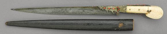 Bonhams : An Ottoman coral and silver-mounted bichaq -Select US Arms Type-