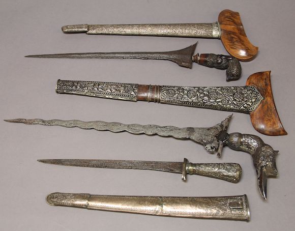 Bonhams : A lot of three Indonesian knives -Select US Arms Type-
