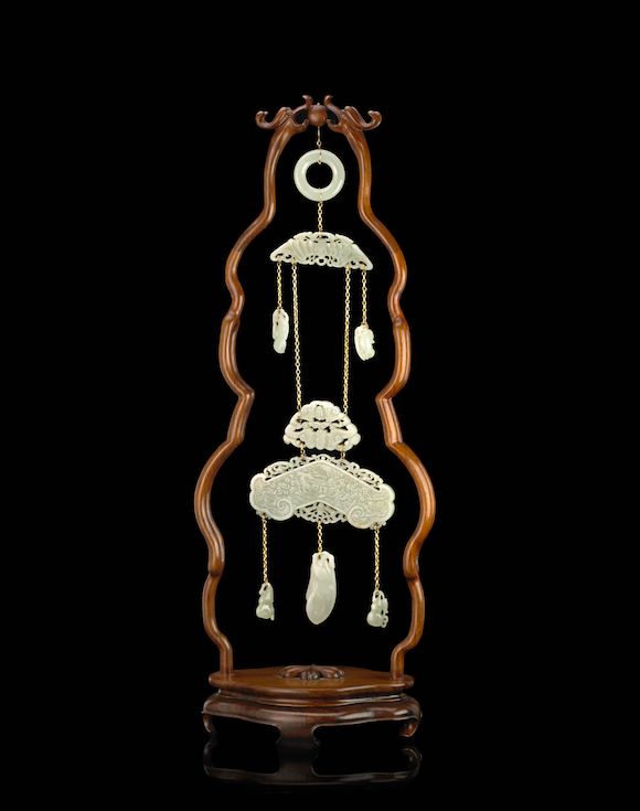 Bonhams : An assembled white jade chime 19th century
