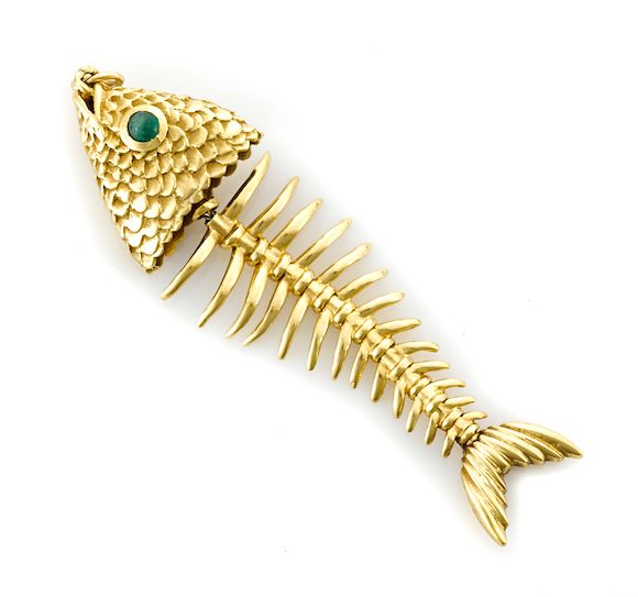 Bonhams : An eighteen karat gold articulated fish bone pendant with ...